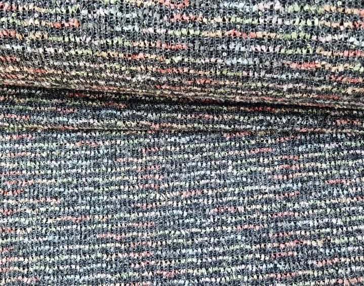 Bouclé gebreid met pailletten